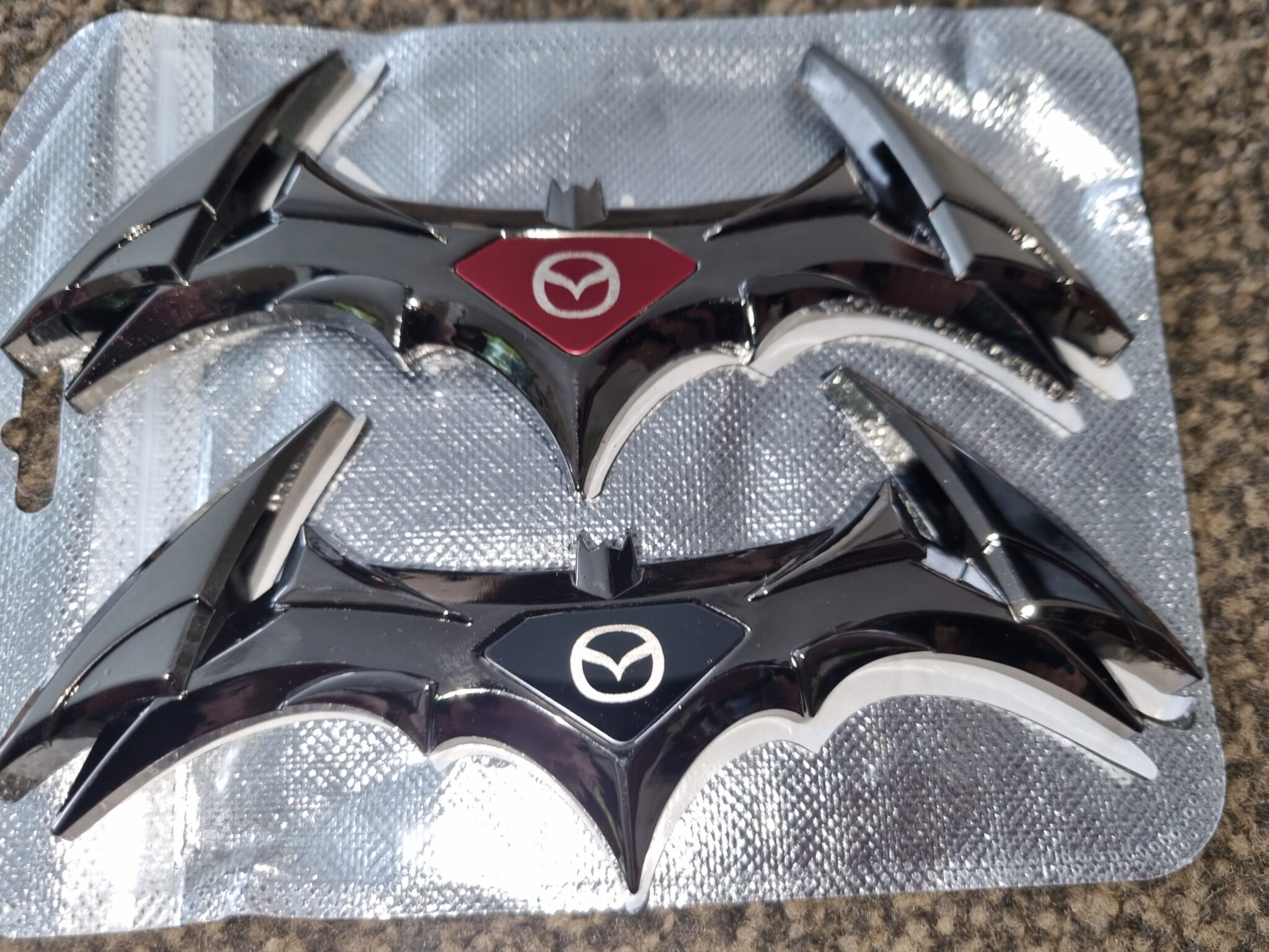 Mazda Batman Style Logo Badge – JohnnypartsNZ